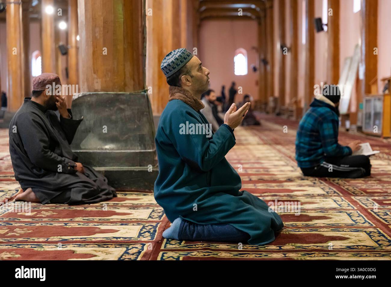 Srinagar, India. 03rd Mar, 2025. Kashmiri Muslims pray inside Jamia ...
