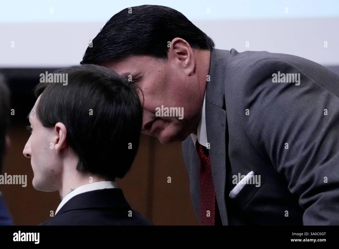 Robert E. Crimo III, left, listens to attorney Gregory Ticsay during ...
