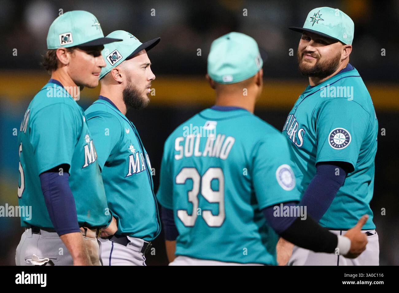 From left, Seattle Mariners shortstop Colt Emerson, second baseman ...