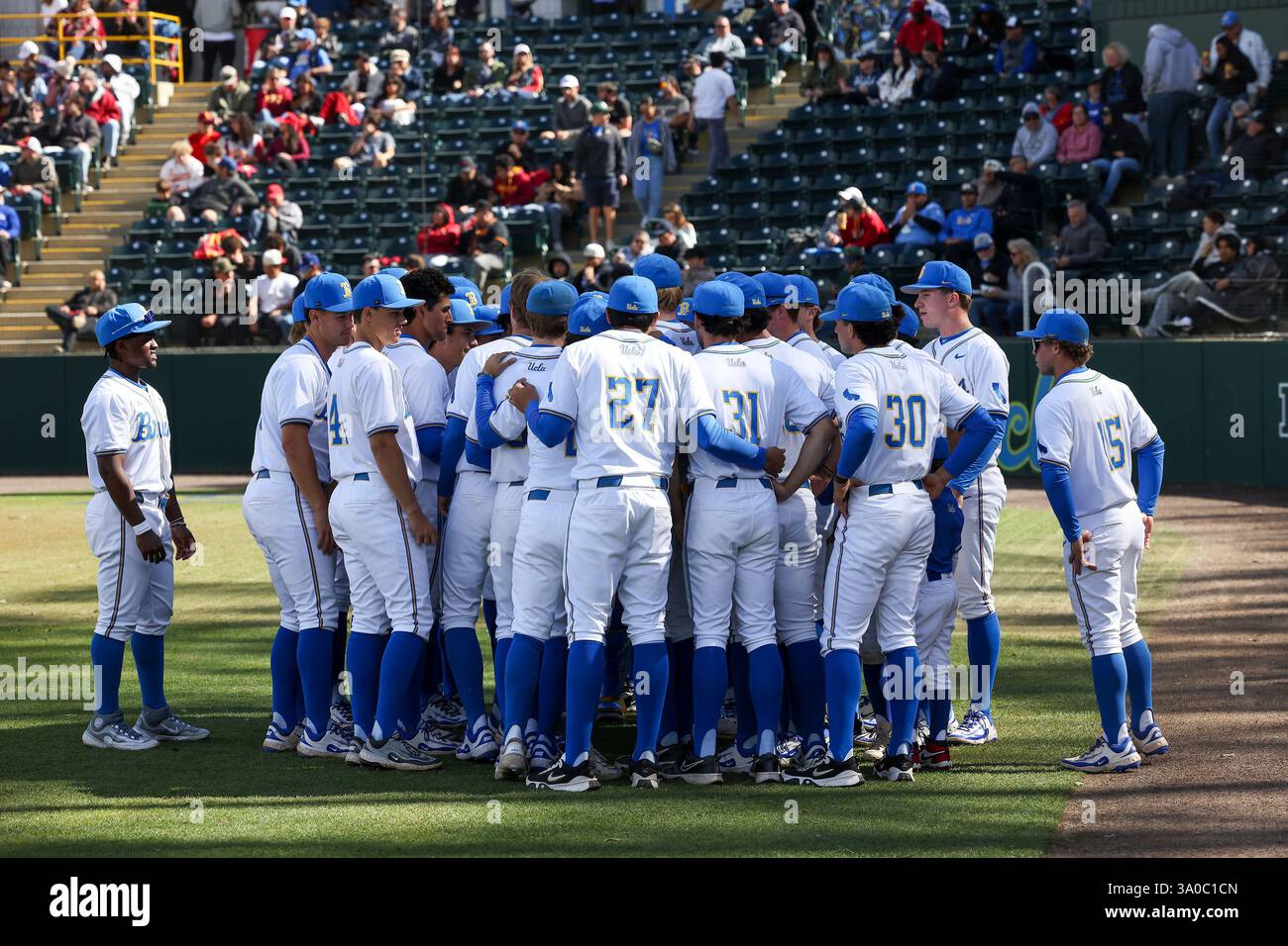 March 2, 2025: UCLA baseball team huddles up before the start of an ...
