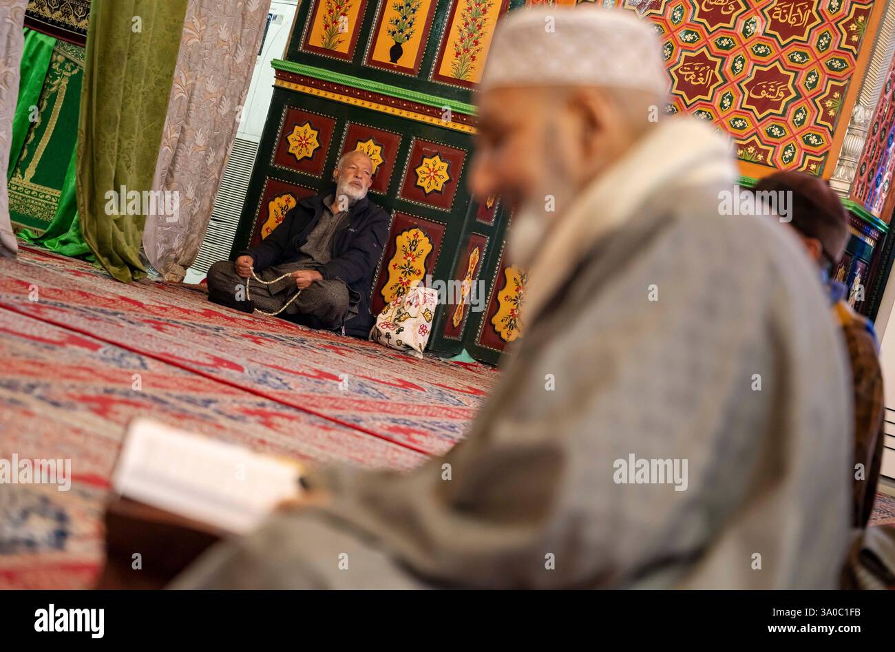 Kashmiri Muslims pray inside a shrine on the second day of Ramadan ...