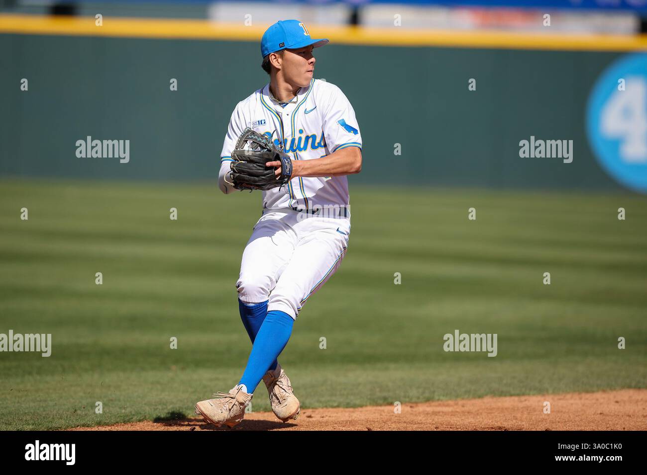 March 2, 2025: UCLA infielder Cameron Kim (9) warms up during an NCAA ...