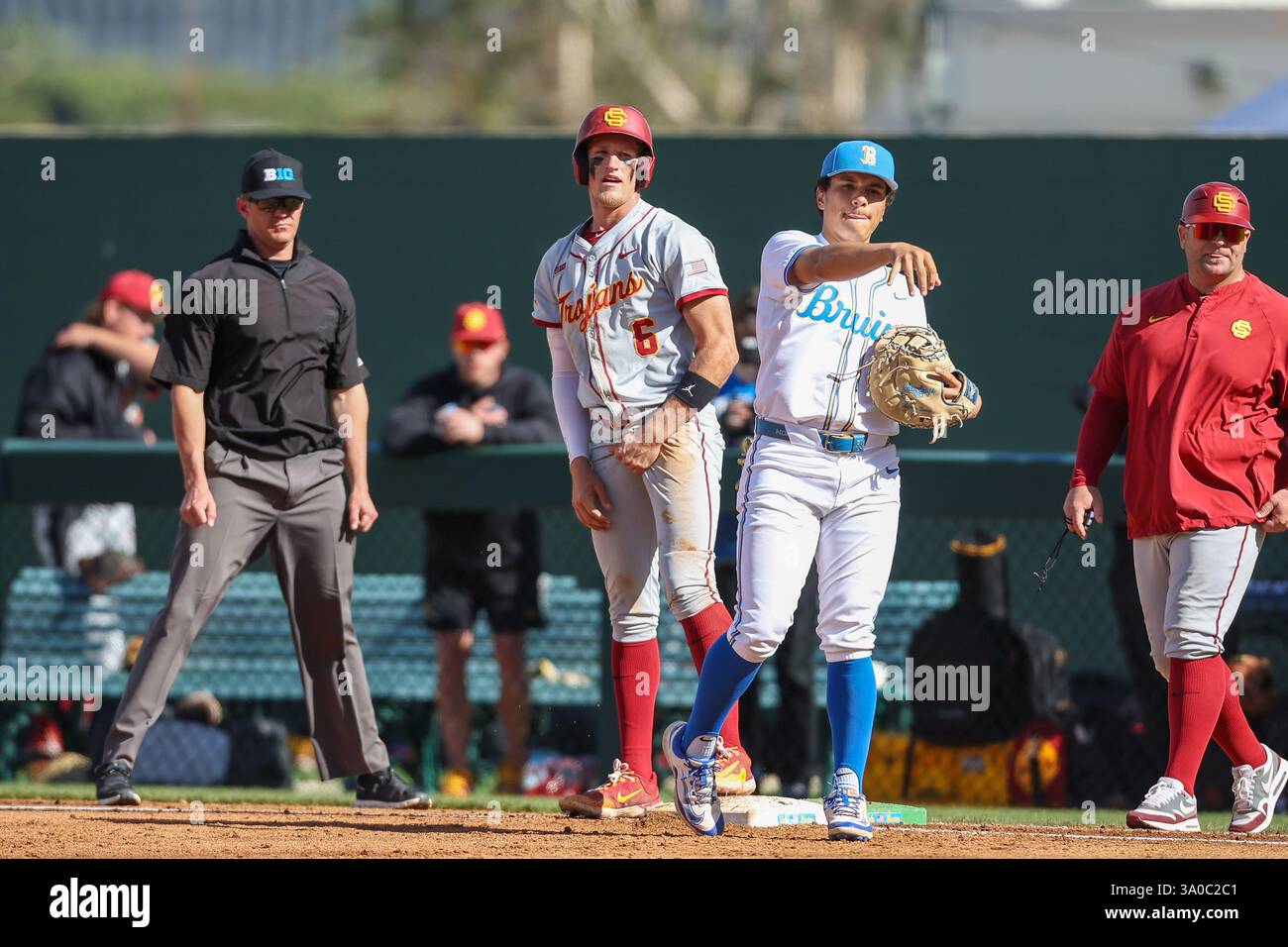 March 2, 2025: USCâ€™s Dean Carpentier (6) and UCLA first baseman ...