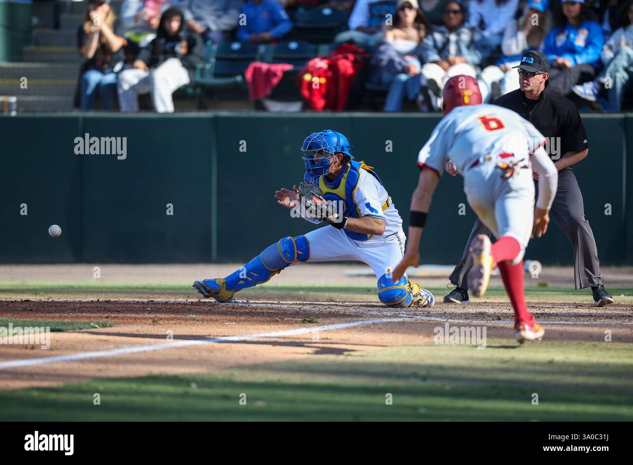 Los Angeles, USA. 2nd Mar, 2025. UCLA catcher Cashel Dugger (40) tags ...