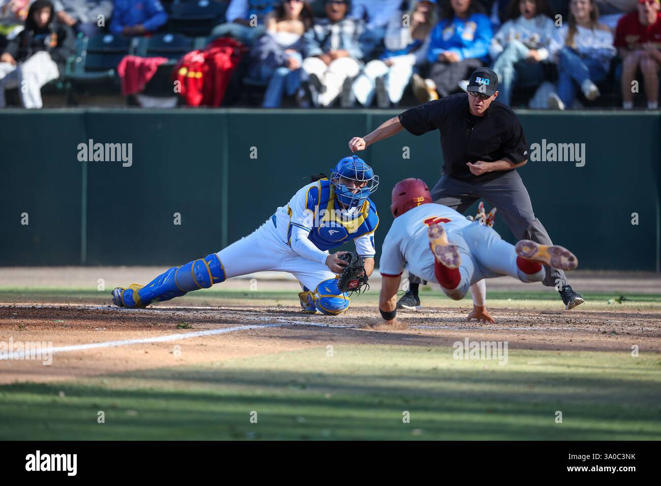 Los Angeles, USA. 2nd Mar, 2025. UCLA catcher Cashel Dugger (40) tags ...