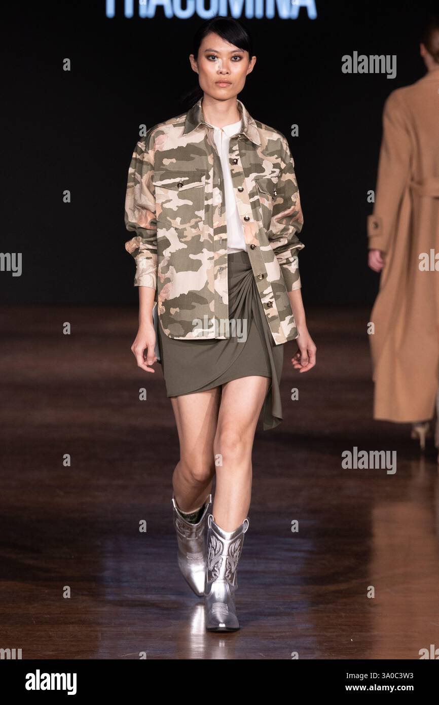 Milan, Italy. 24 Feb, 2025. A model walks the runway during the ...
