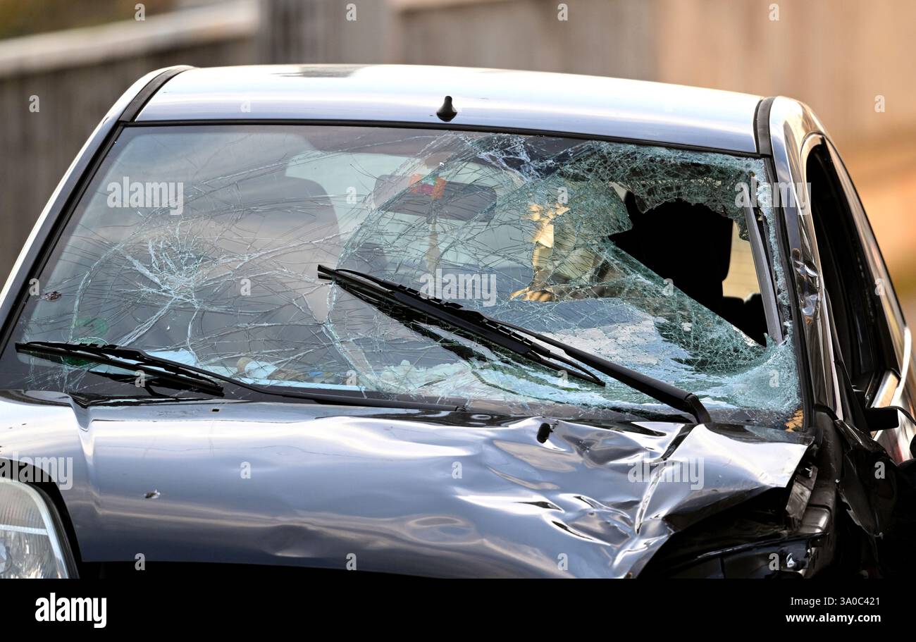 A damaged vehicle stands on an access road to the Rhine bridge, in ...
