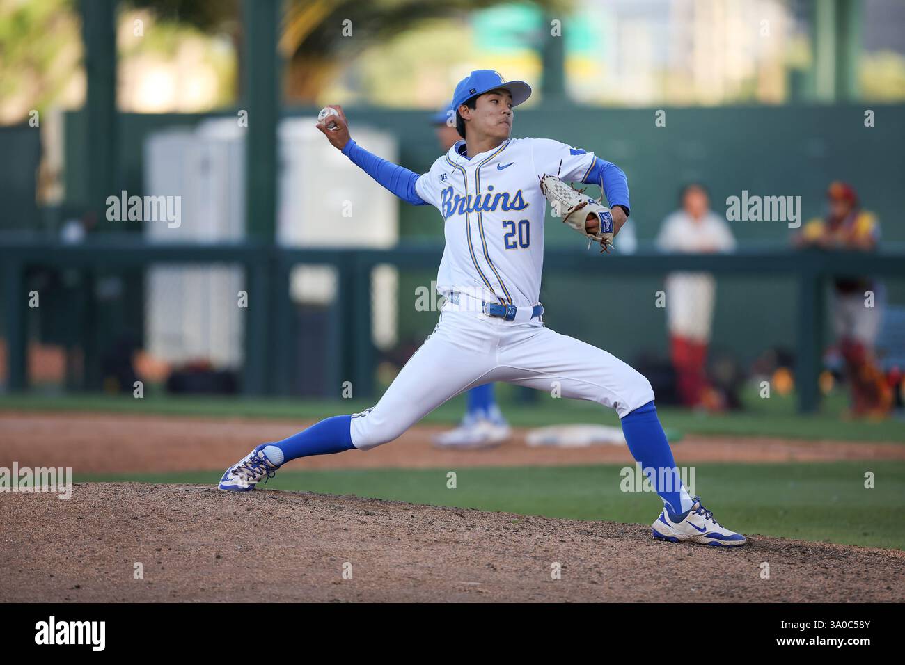 March 2, 2025: UCLA pitcher Justin Lee (20) delivers a pitch during an ...