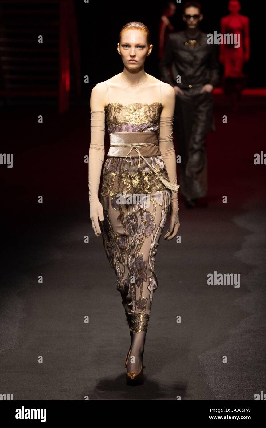 Milan, Italy. 27th Feb, 2025. A model walks the runway during the ...