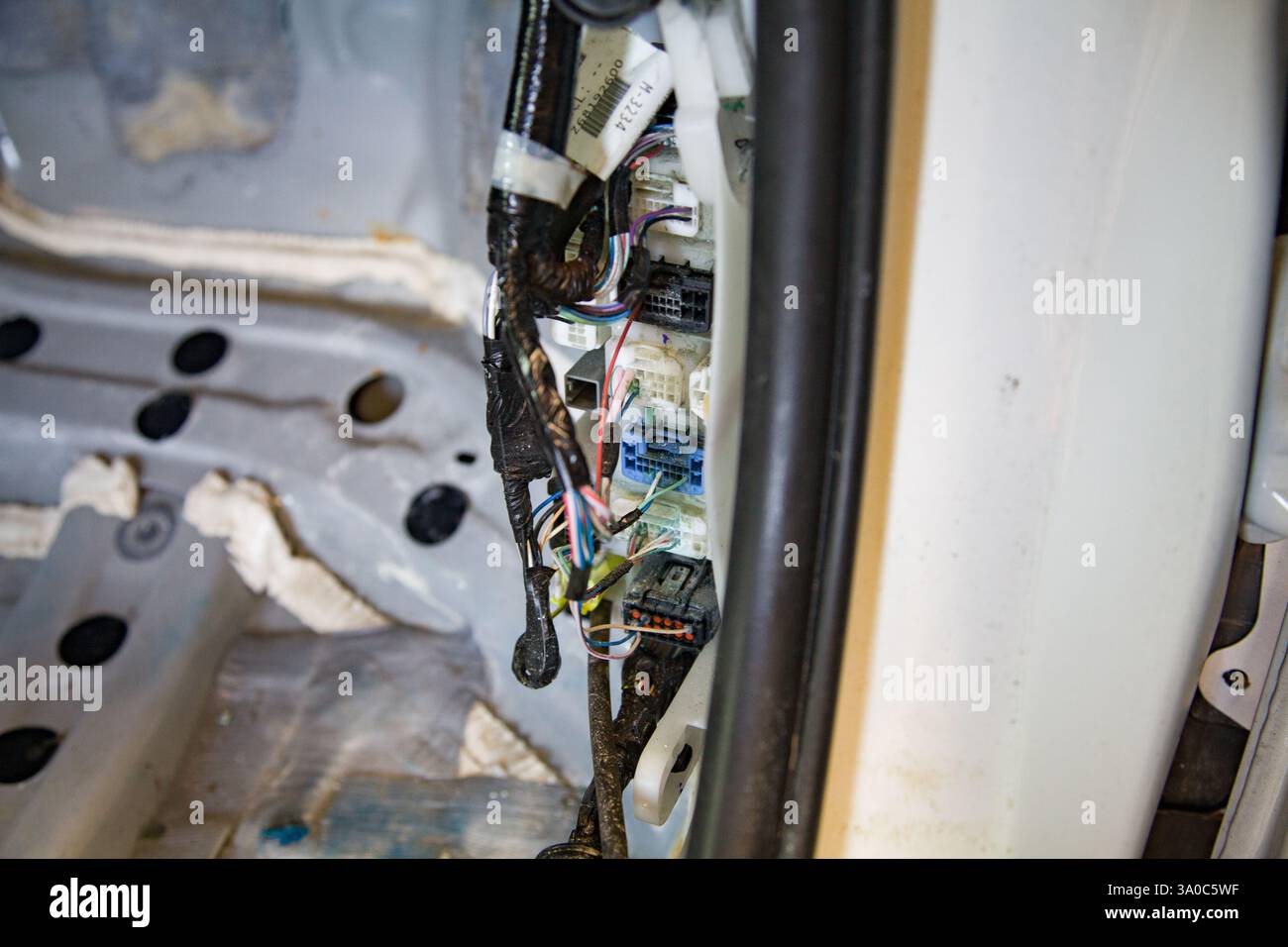 Damaged, oxidized car wiring connectors inside the vehicle after ...