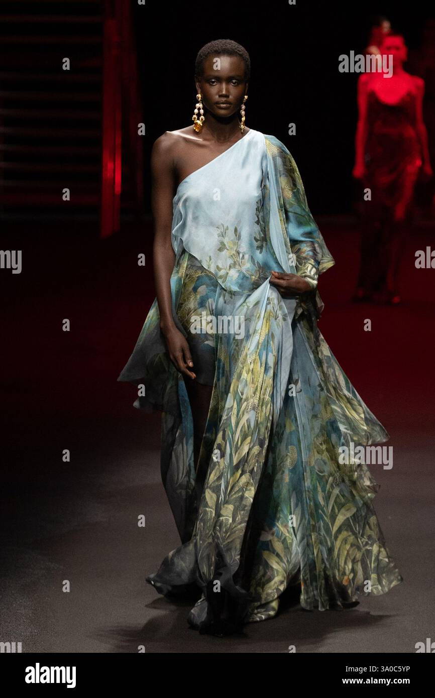 Milan, Italy. 27th Feb, 2025. A model walks the runway during the ...