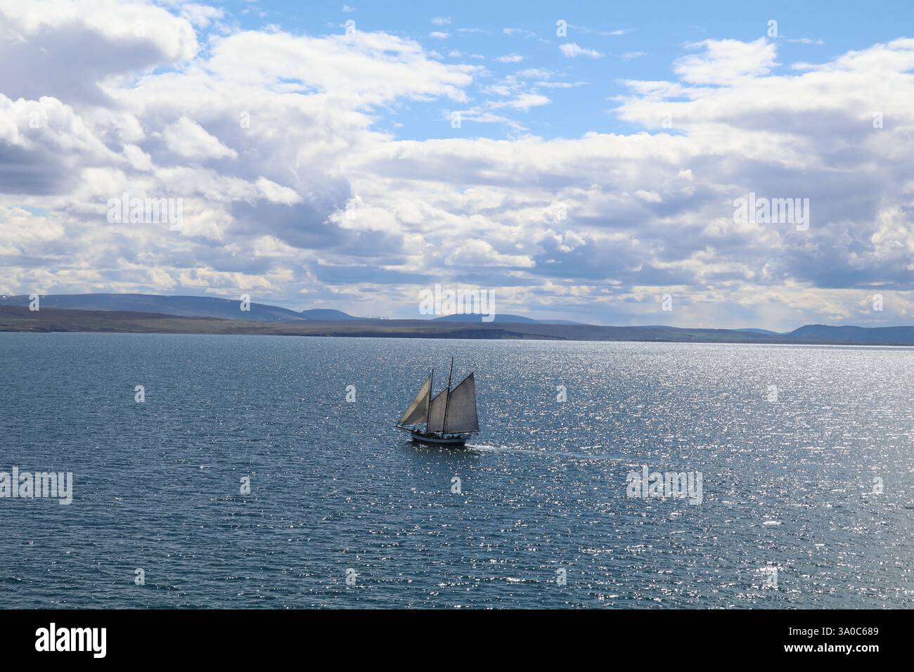 Traditional sailing vessel glides across hi-res stock photography and ...