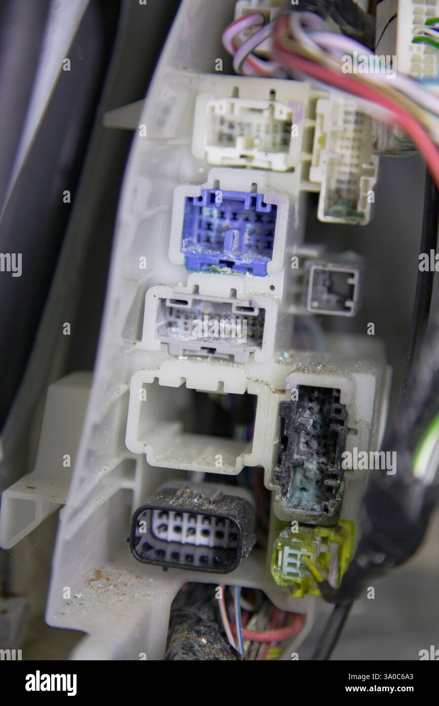 Damaged, oxidized car wiring connectors inside the vehicle after ...