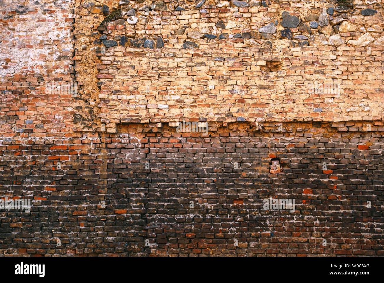 Texture of an old worn brick wall as background Stock Photo - Alamy