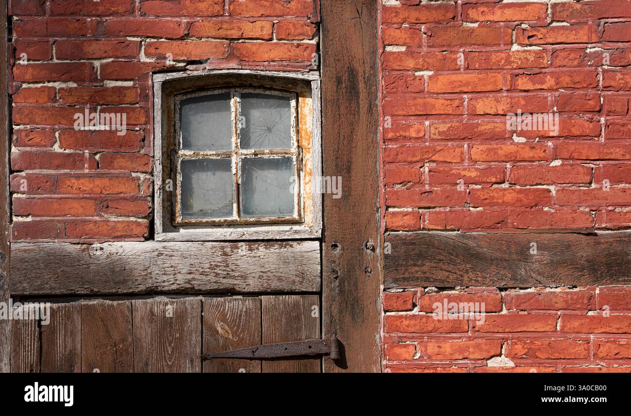 Old farmhouse stall window with half-timbering Stock Photo - Alamy