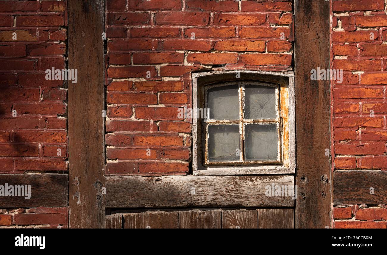 Old farmhouse stall window with half-timbering Stock Photo - Alamy