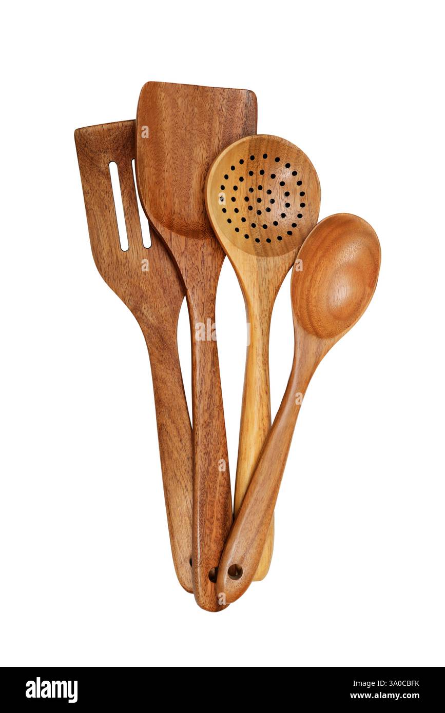 A set of four beautifully crafted wooden kitchen utensils, including ...