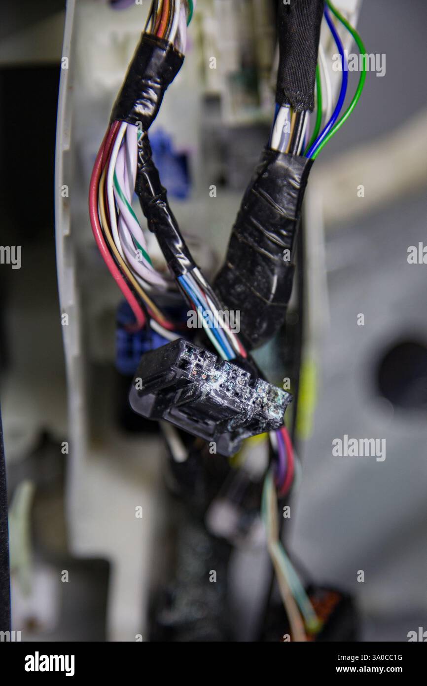 Damaged, oxidized car wiring connectors inside the vehicle after ...