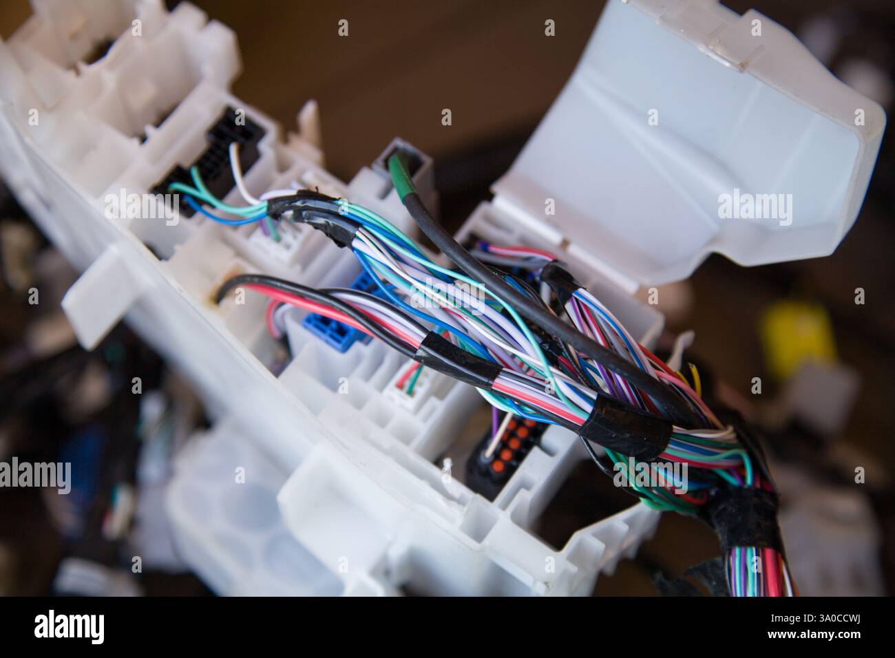 Wires, connectors, modules, and connections from a new car wiring ...