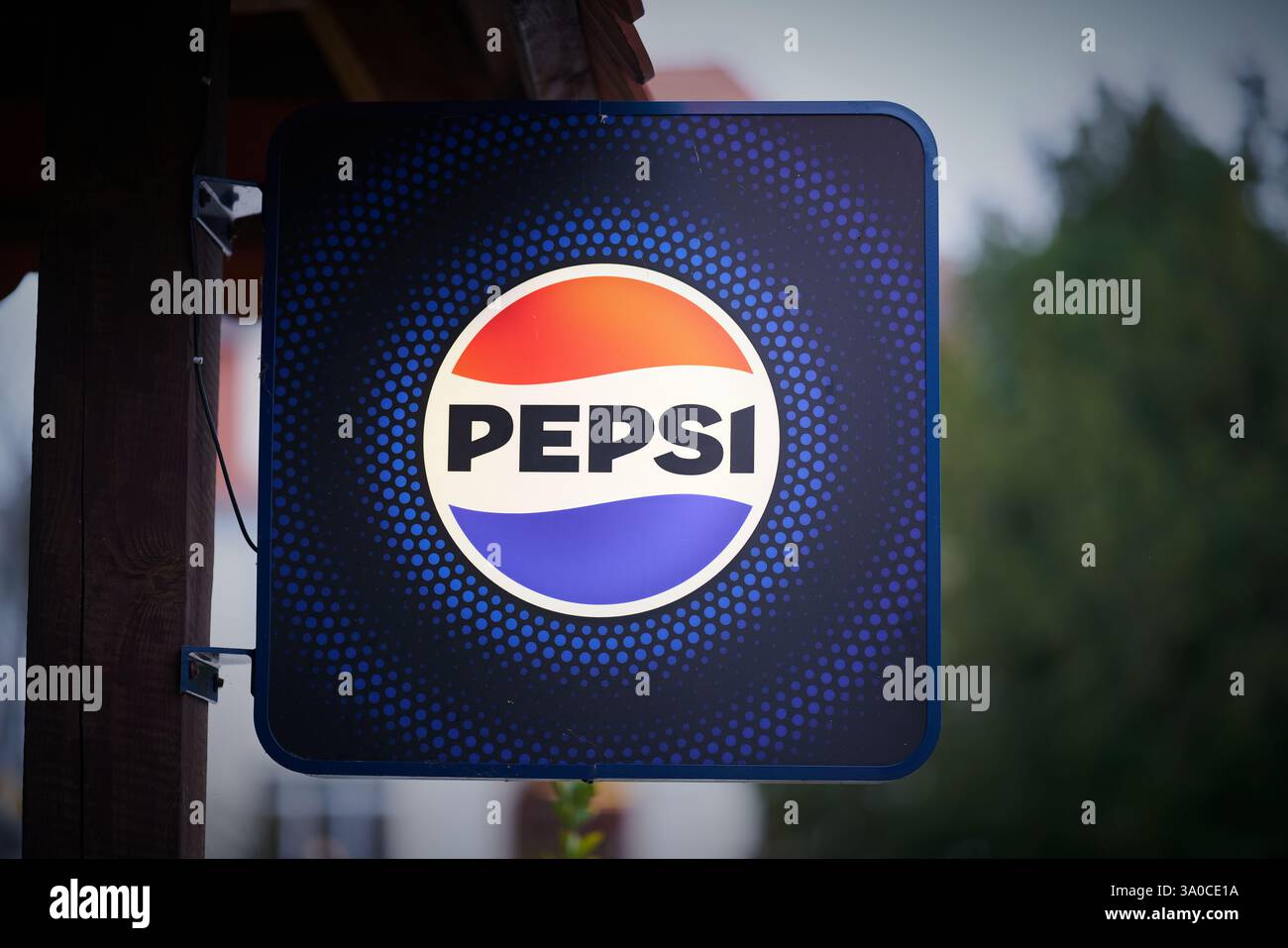 Illuminated sign for the Pepsi-Cola brand of the manufacturer PepsiCo ...