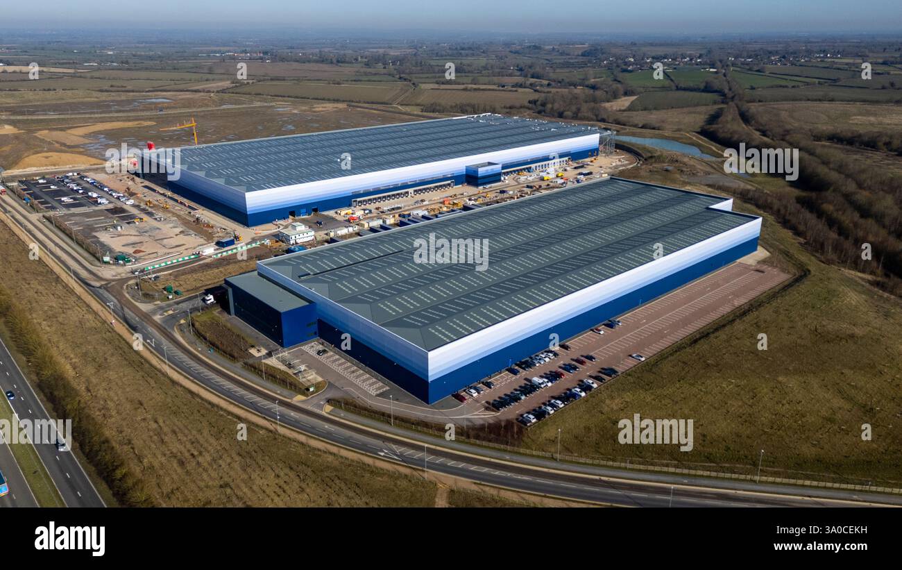 Aerial view of a large distribution center with loading docks and ...