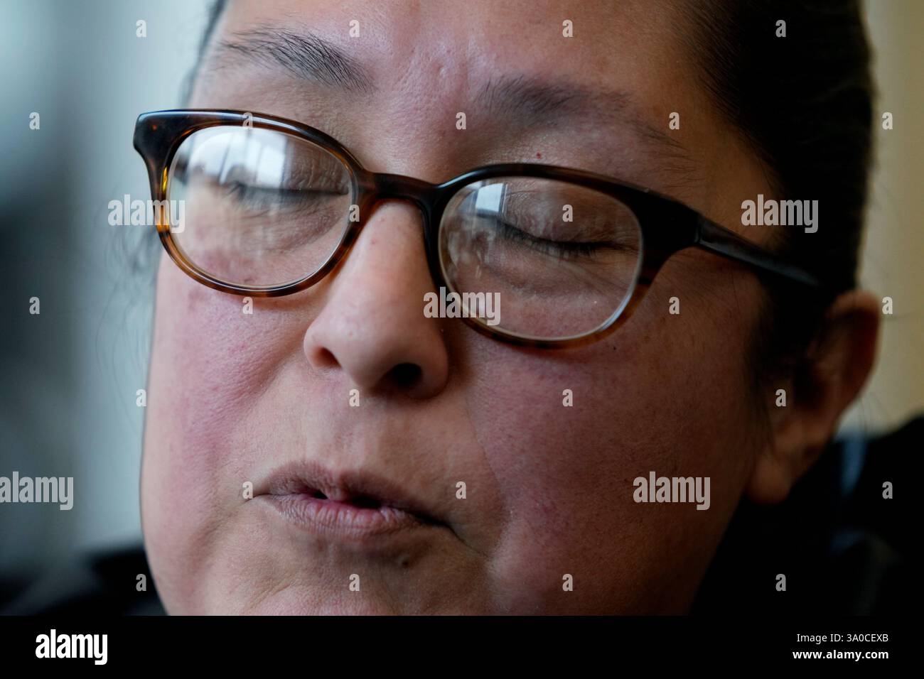 Highland Park parade survivor Ashbey Beasley closes her eyes as she ...
