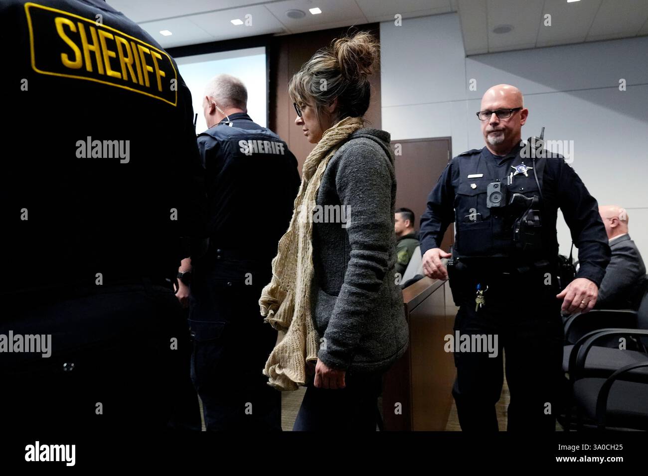 Robert E. Crimo III's mother Denise Pesina walks to listen to Judge ...
