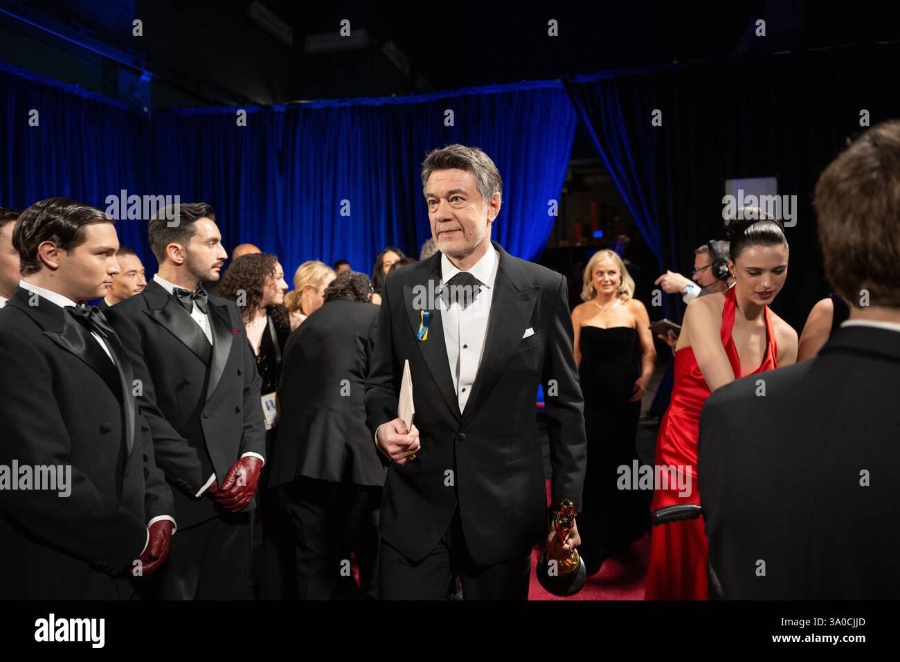Los Angeles, USA. 02nd Mar, 2025. Peter Straughan poses backstage with ...