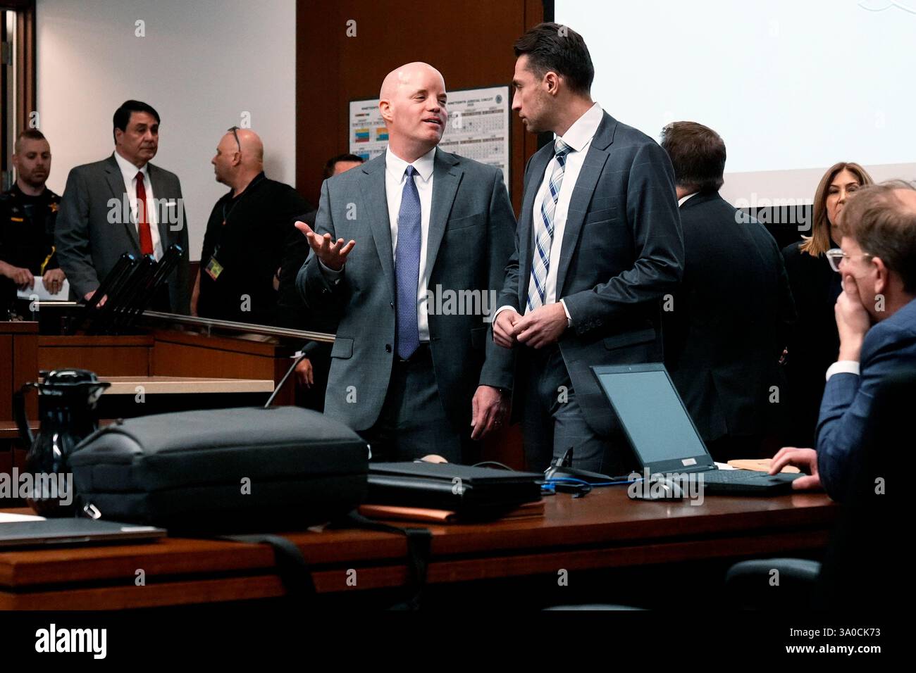 Lake County Assistant State's Attorney Ben Dillon, left, talks with ...