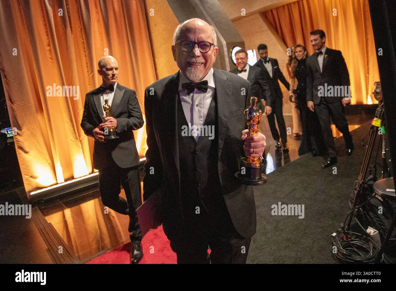 Gareth John, Richard King, and Ron Bartlett pose backstage with the ...