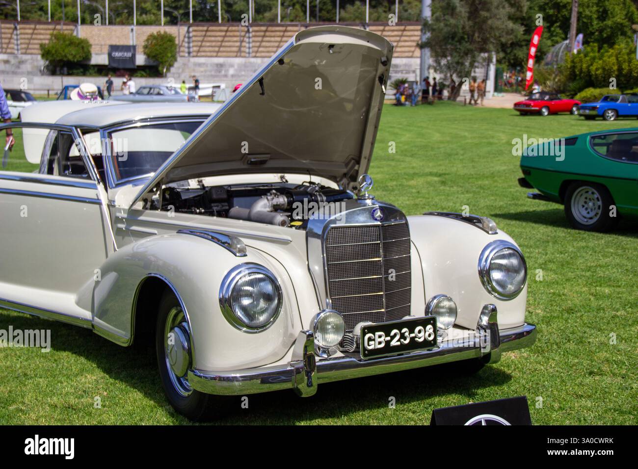 Gleaming white mercedes benz 300 s w188 coupe with open hood ...