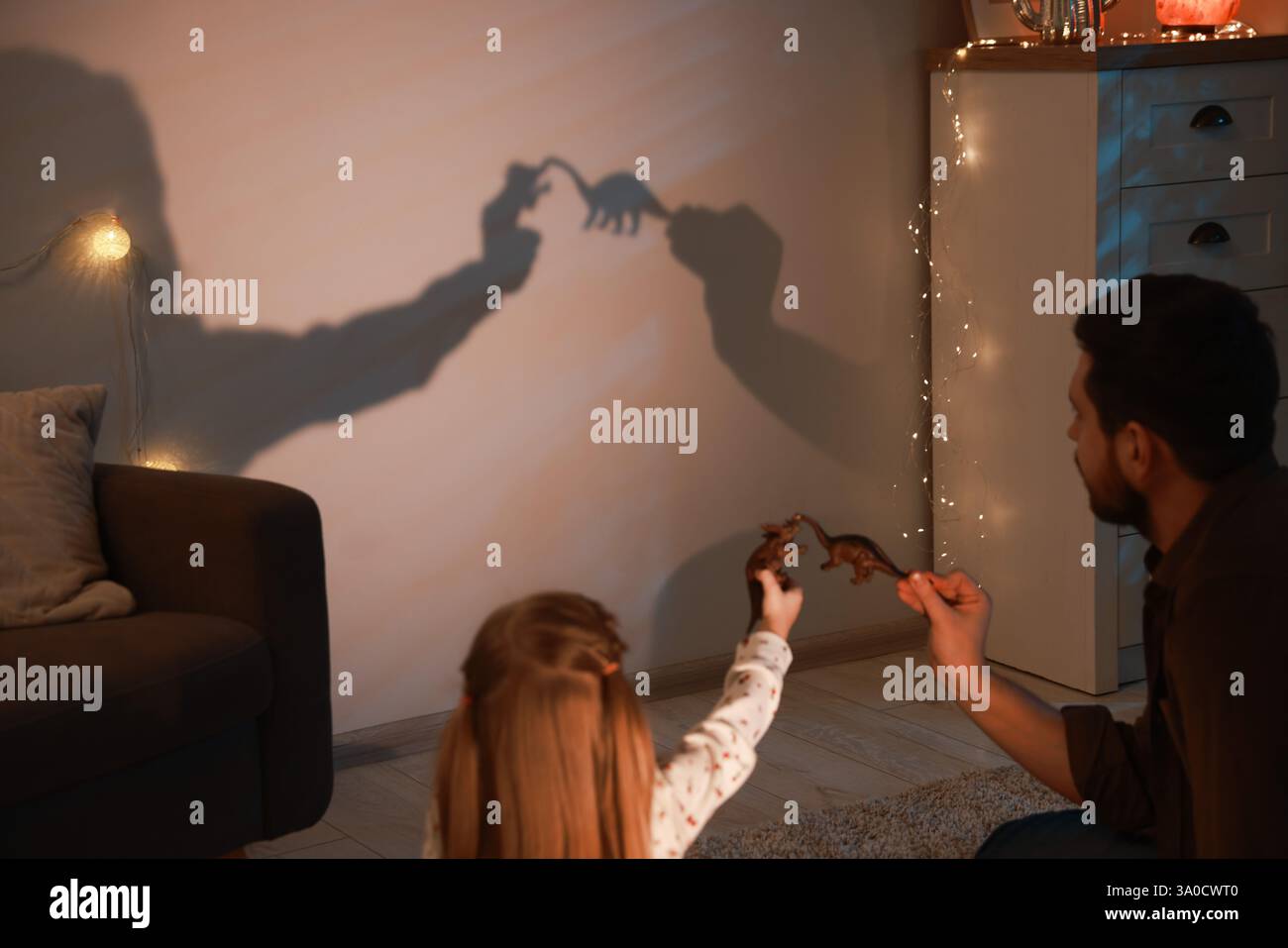 Shadow play father daughter hi-res stock photography and images - Alamy