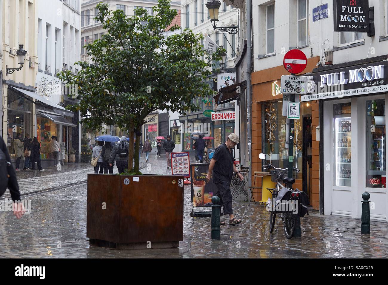 Brussels, Belgium - May 25, 2024: Crowded Rainy Street in Brussels with ...