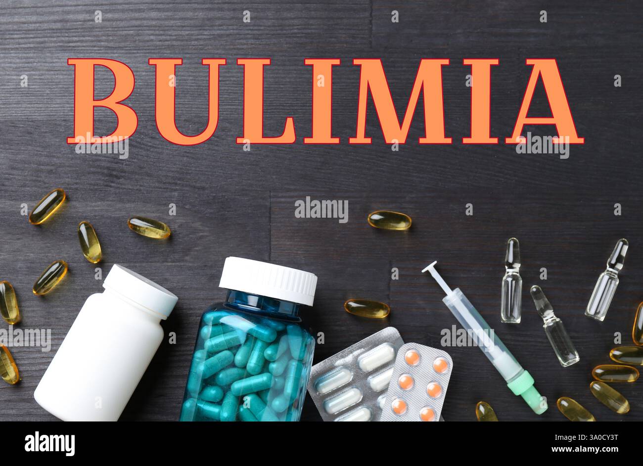 Bulimia nervosa. Different drugs on dark grey background, flat lay ...
