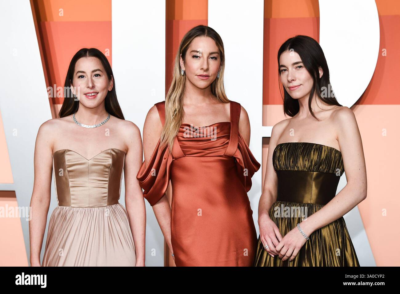 Haim walking on the red carpet at the 2025 Vanity Fair Oscar Party held ...