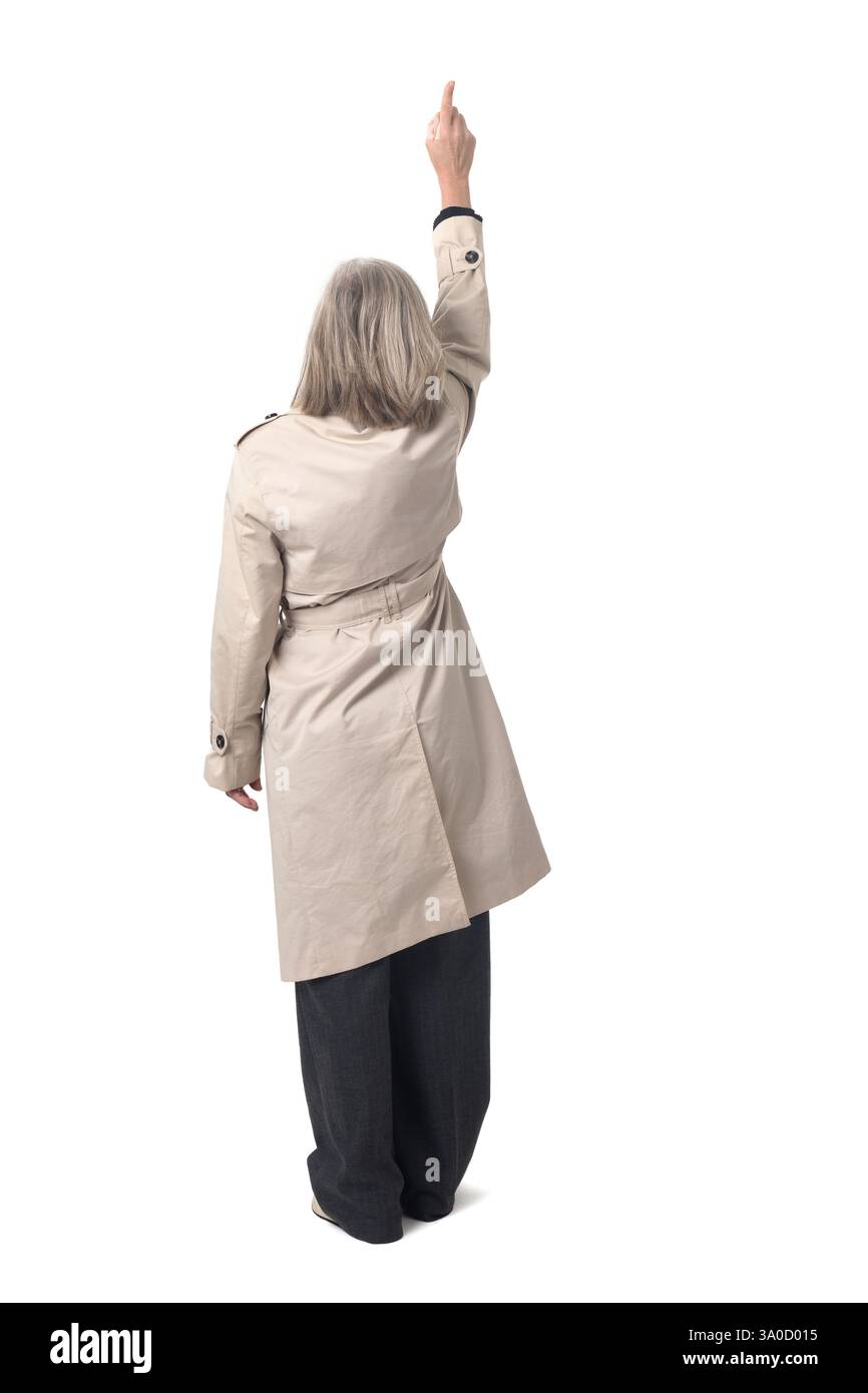 back view of an adult woman standing pointing up on white background ...