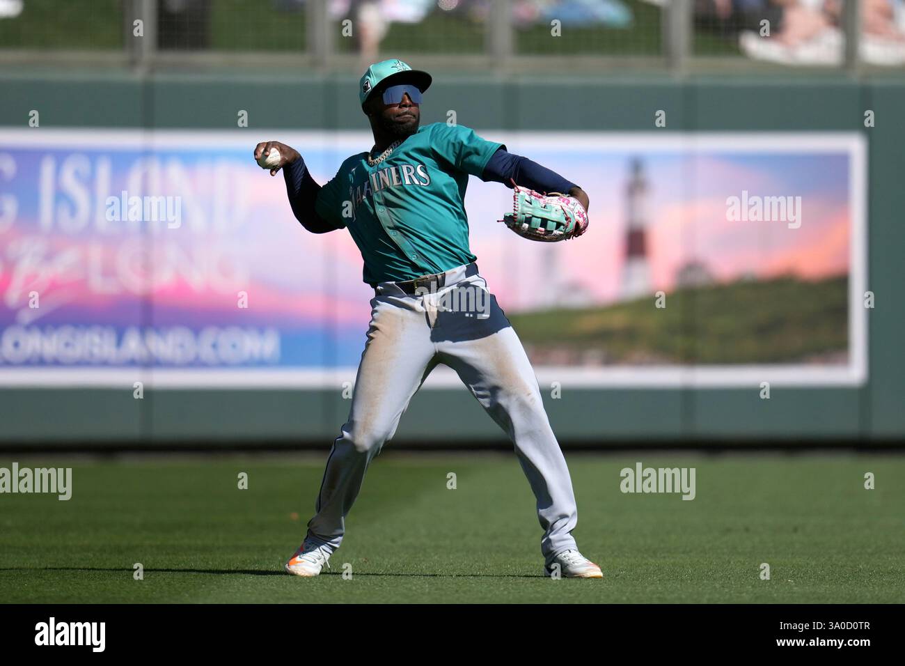 Seattle Mariners left fielder Randy Arozarena throws to the infield ...