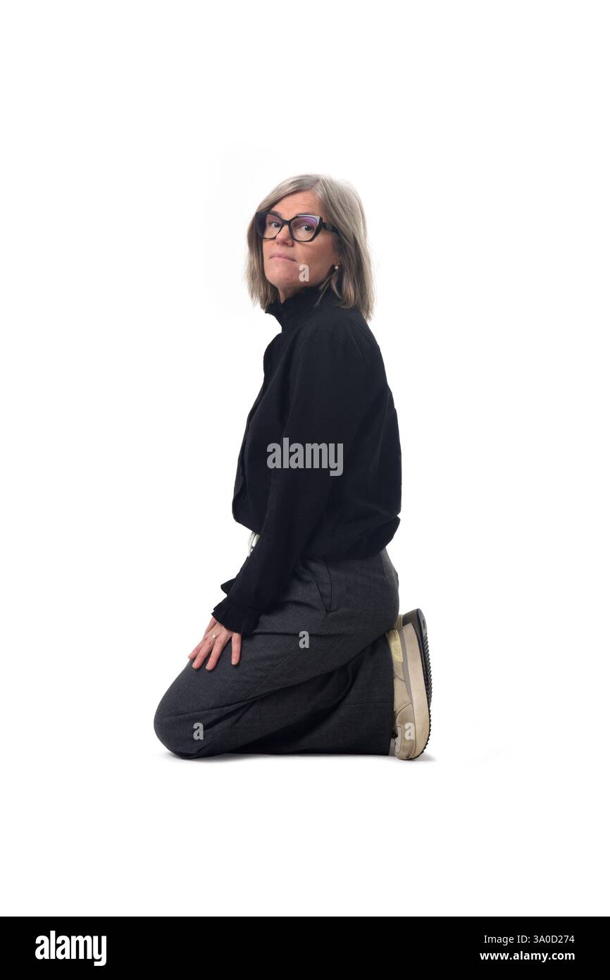 profile woman kneeling looking at camera on white background Stock ...