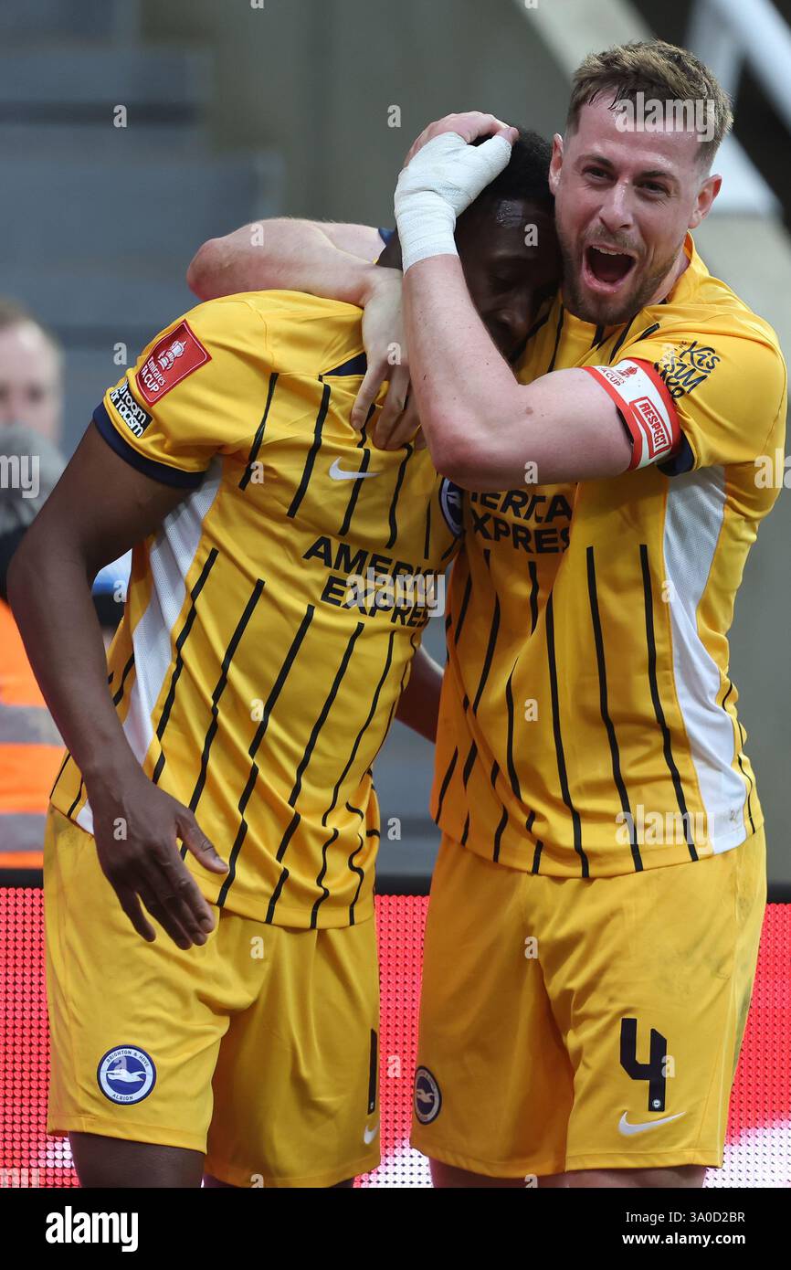 Brighton & Hove Albion's Danny Welbeck celebrates with Adam Webster ...