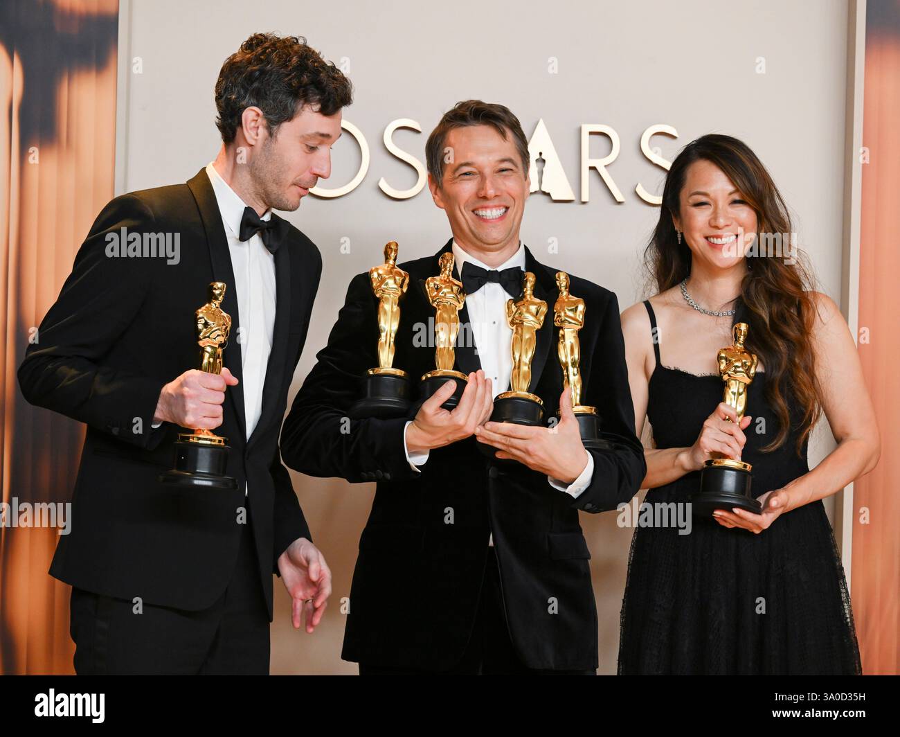 March 2, 2025, Los Angeles, California, USA: (L-R) Alex Coco, Sean Baker, and Samantha Quan ...