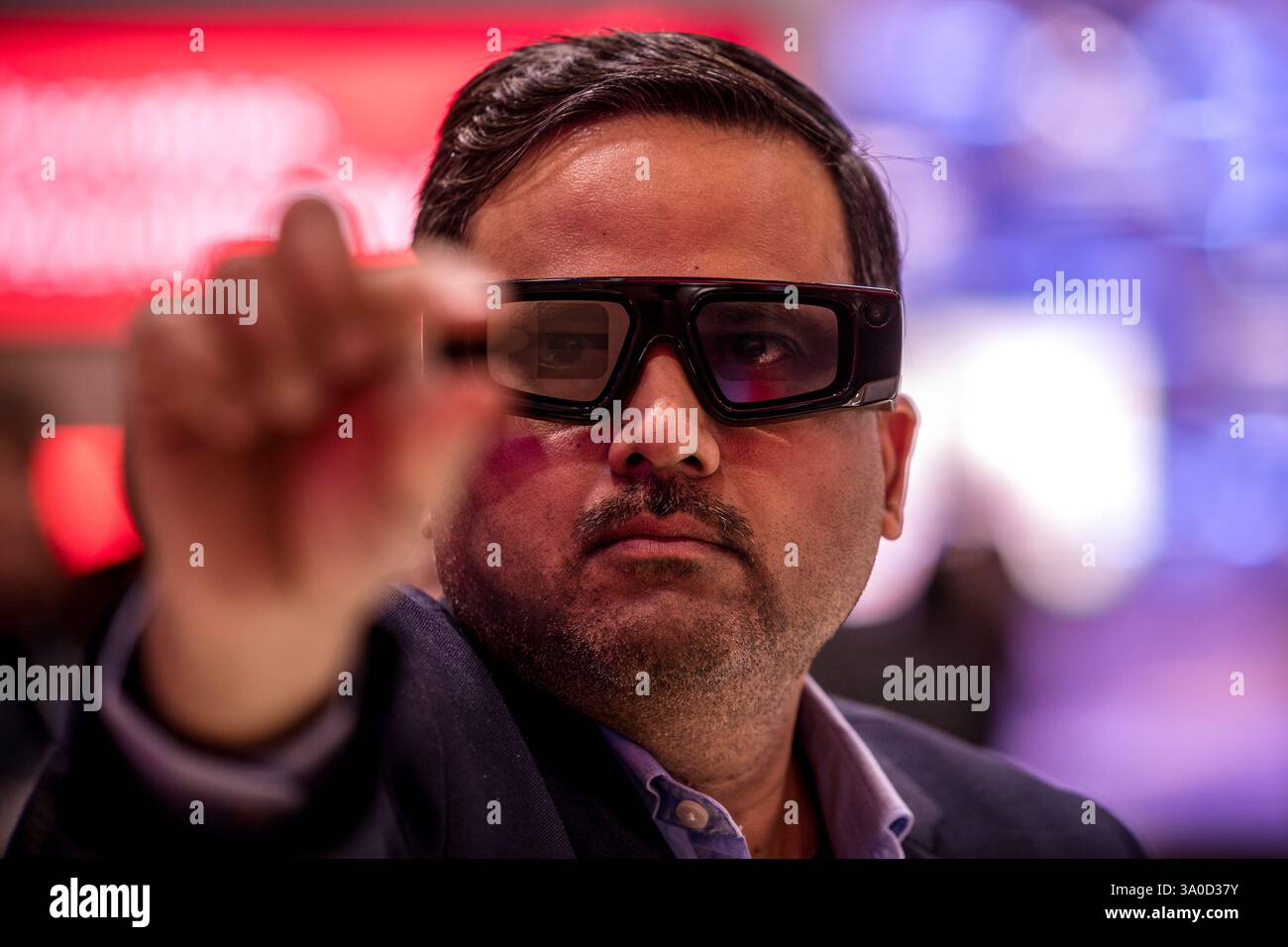 Barcelona, Spain. 3 March, 2025: A visitor experiences AI smart glasses ...