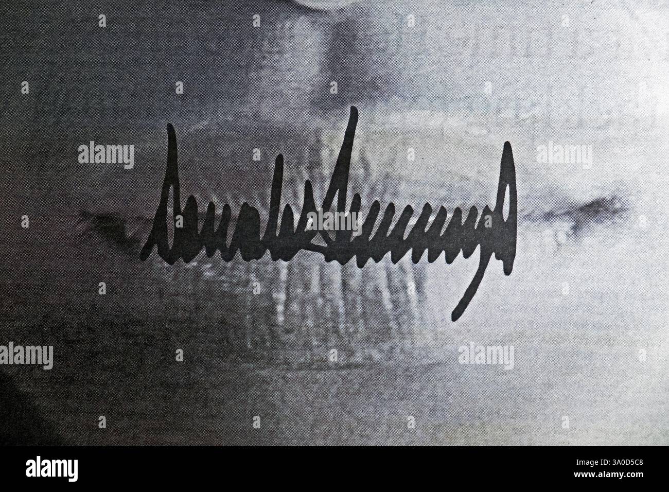 US president Donald Trump 's signature written over on lips mouth in ...