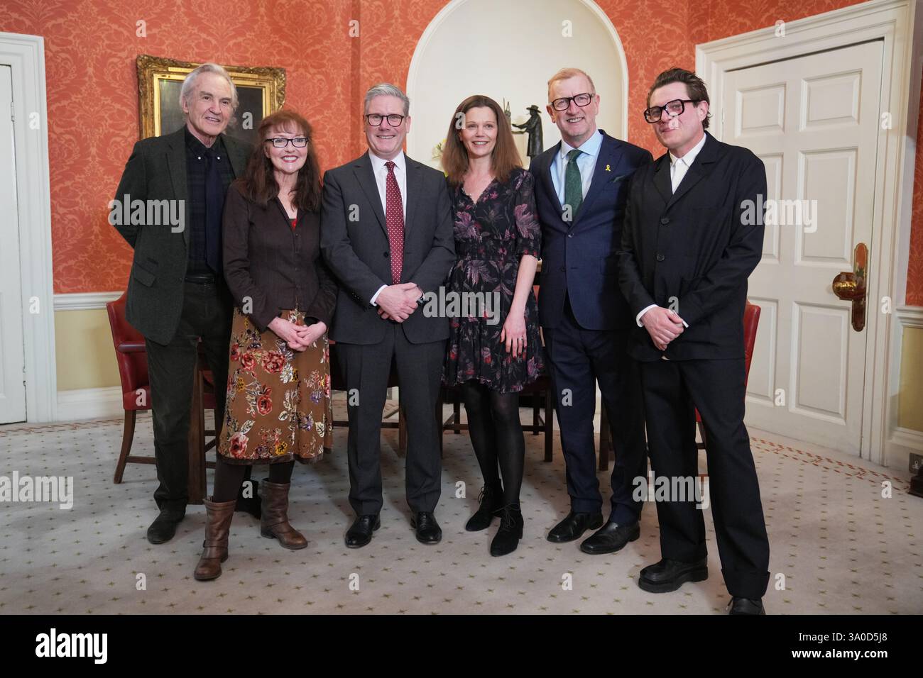 Prime Minister Sir Keir Starmer and his wife Lady Victoria (centre ...