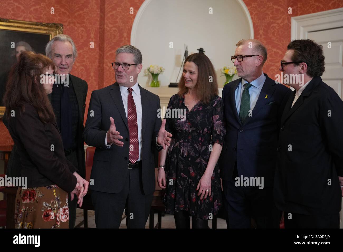 Prime Minister Sir Keir Starmer and his wife Lady Victoria (centre ...