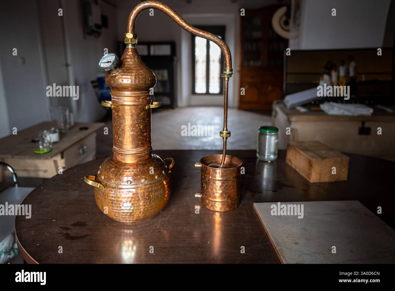 A copper distillation apparatus for extracting essential oils from wild ...