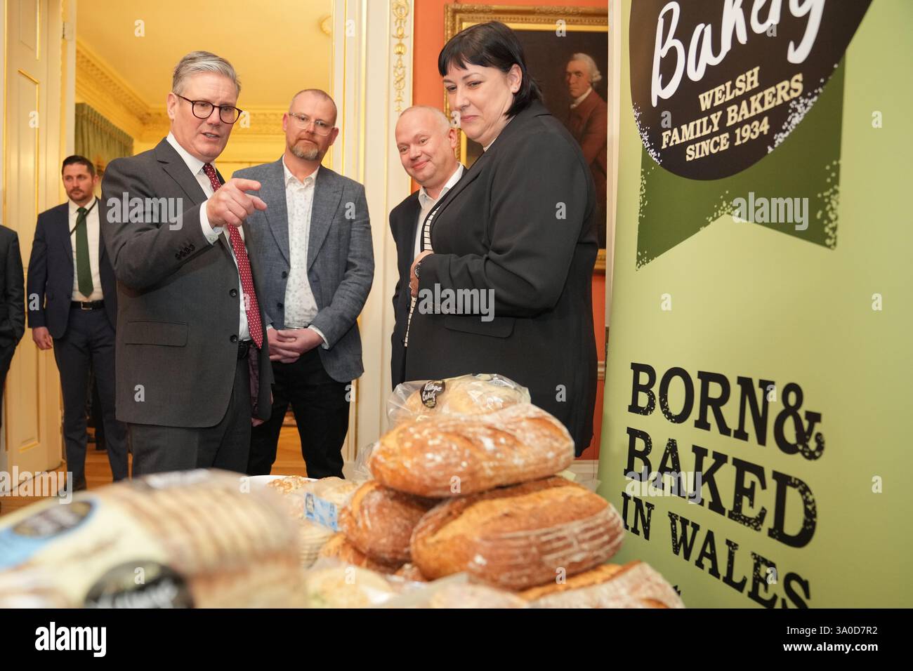 Prime Minister Sir Keir Starmer (centre left) speaks to Welsh business ...