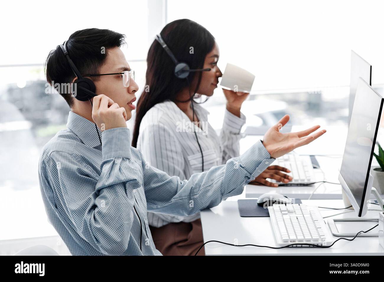 Female consultant communicating client hi-res stock photography and ...