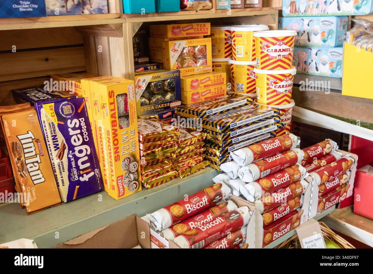 retail shop display of biscuits and cookies with Tunnocks tea cakes ...