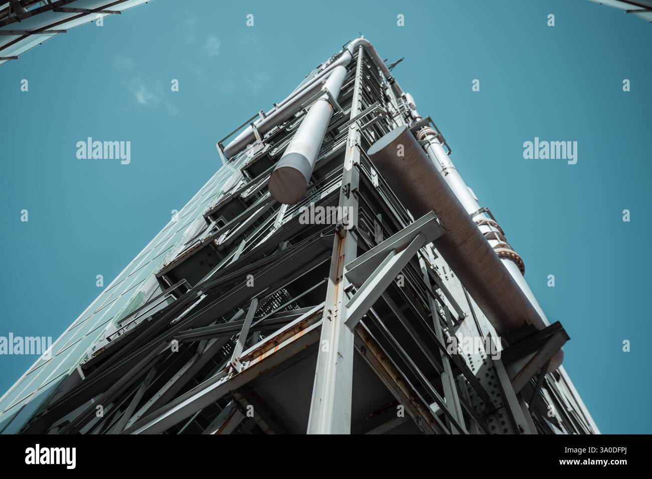 Low-angle view of a modern industrial building with exposed steel ...
