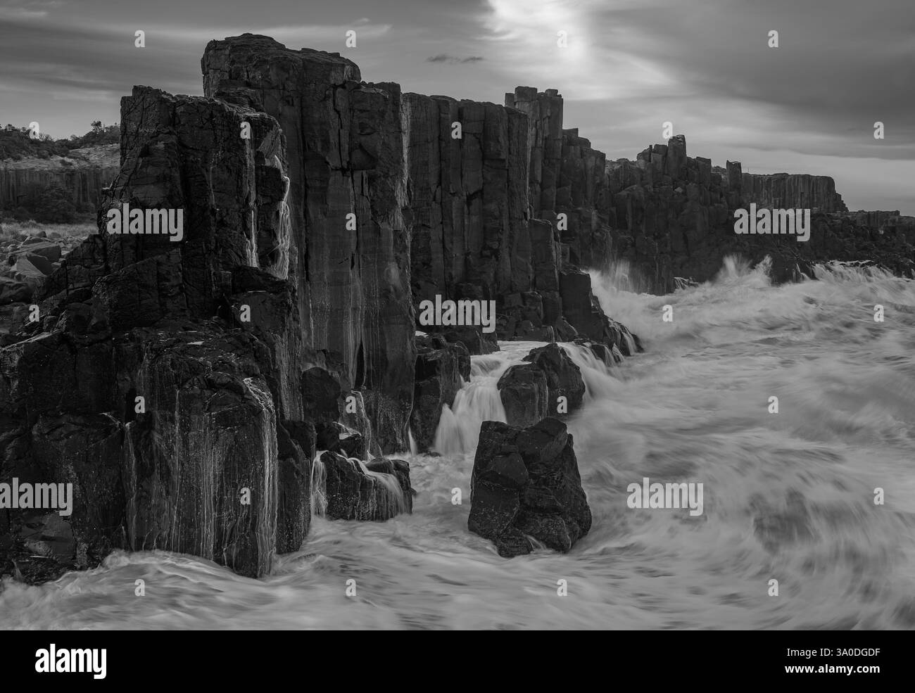 Waves crash rocks Black and White Stock Photos & Images - Alamy